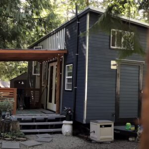 Couple move into two separate tiny homes parked side-by-side and show ...
