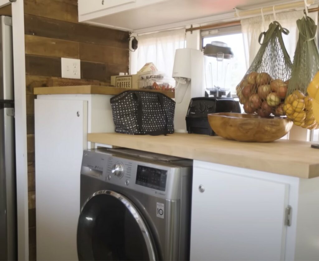 Young couple turn old bus into family home that houses 7 with addition ...