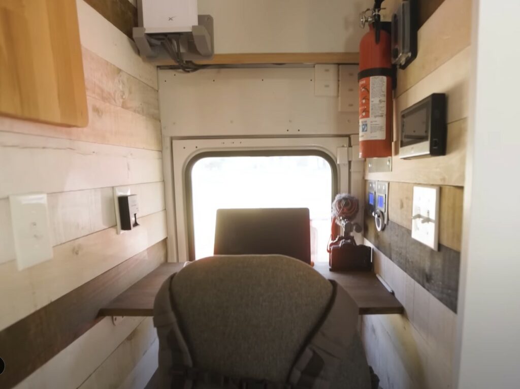 Young couple turn old bus into family home that houses 7 with addition ...