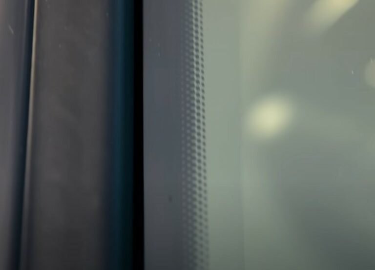 Here’s why there are tiny black dots all around your car’s windshield