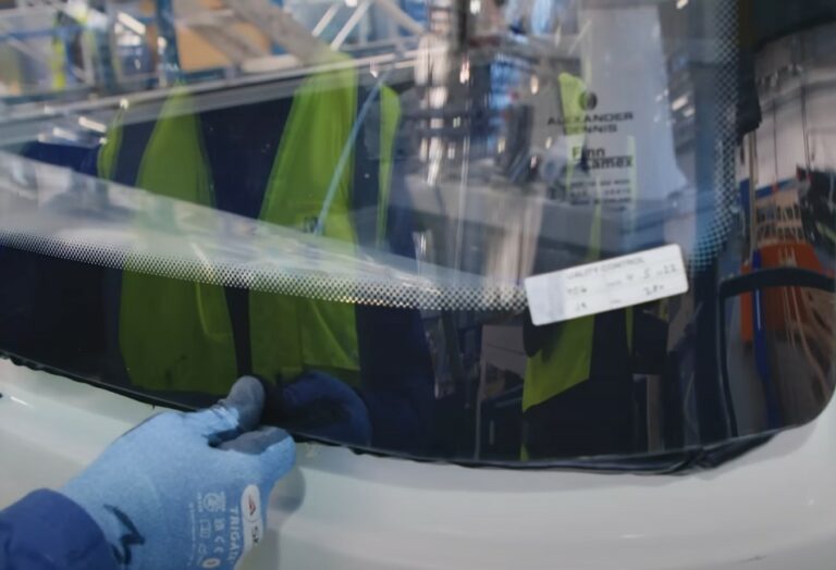 Here’s why there are tiny black dots all around your car’s windshield